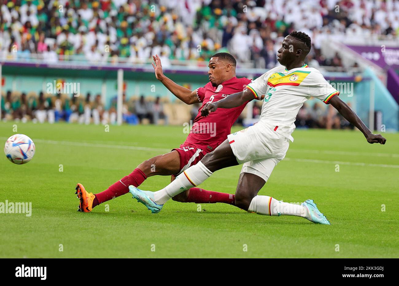 Doha, Qatar. 25th Nov, 2022. Pedro Miguel (L) of Qatar vies with Krepin ...