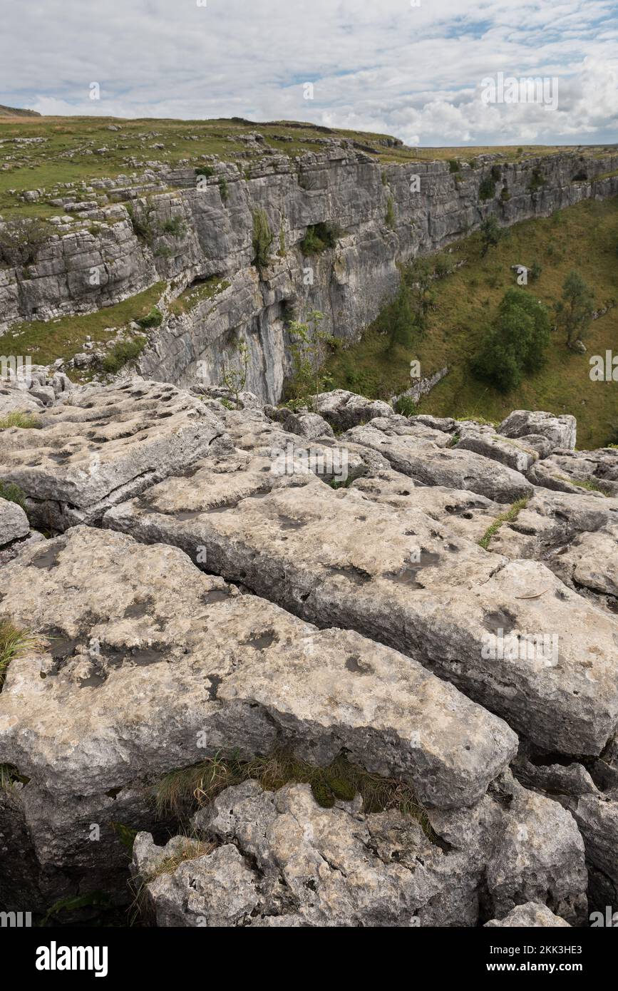 Malham Cove, a fault on the middle Craven Fault, limestone pavement on ...