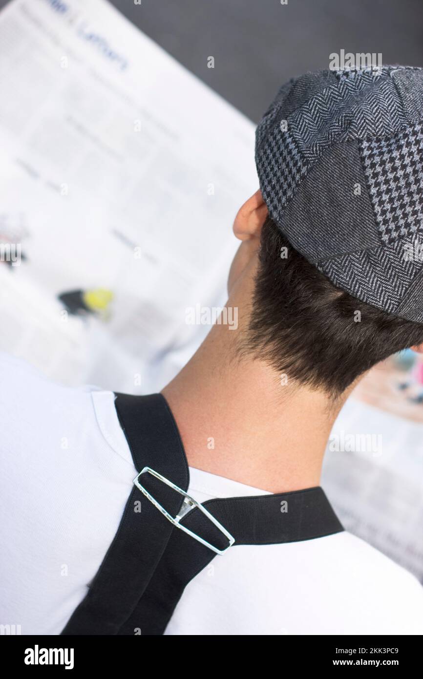 Top Down View On The Back Of A Vintage Gent Reading The Latest News ...