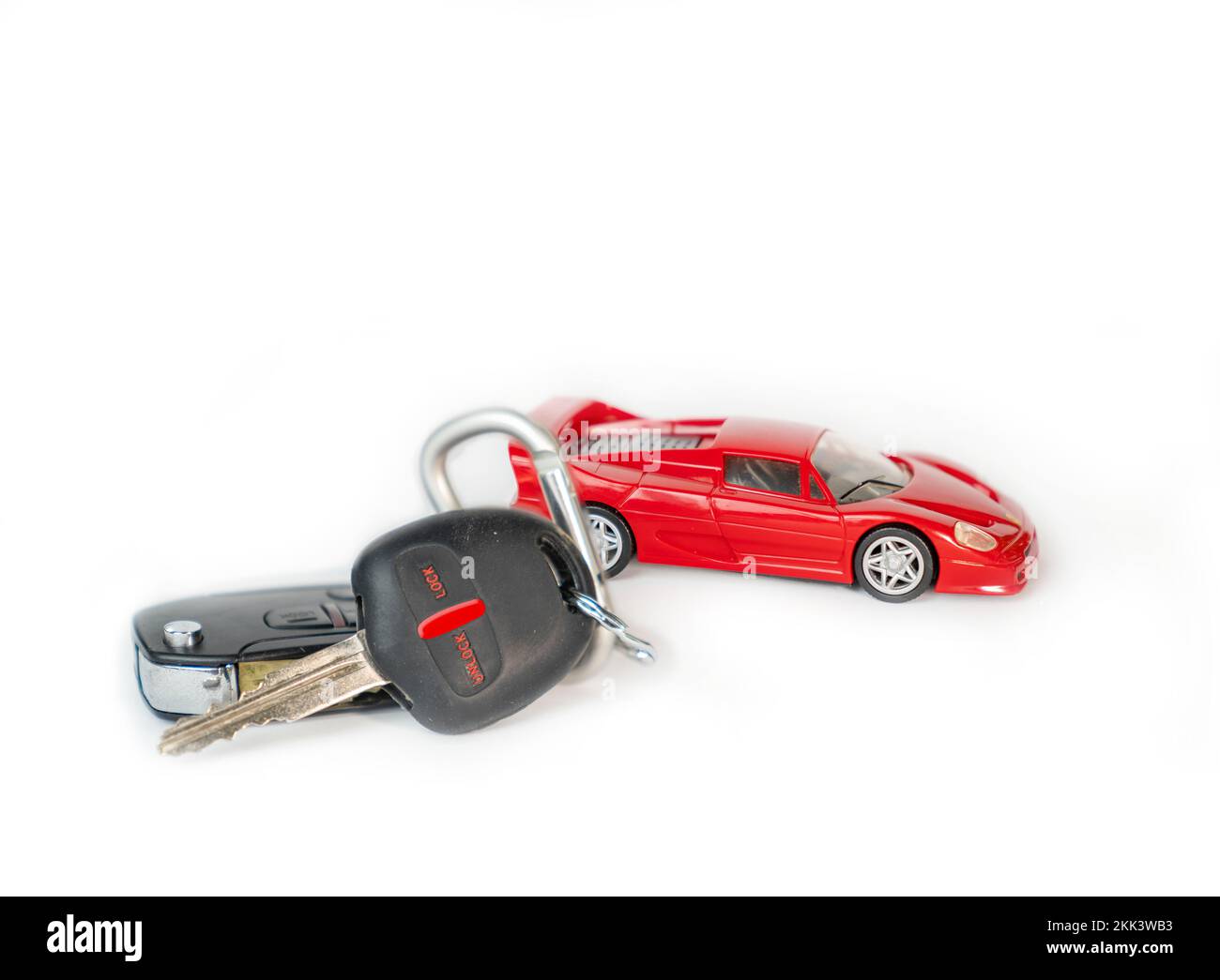 Red super car and key on isolate white background. concept of car ...