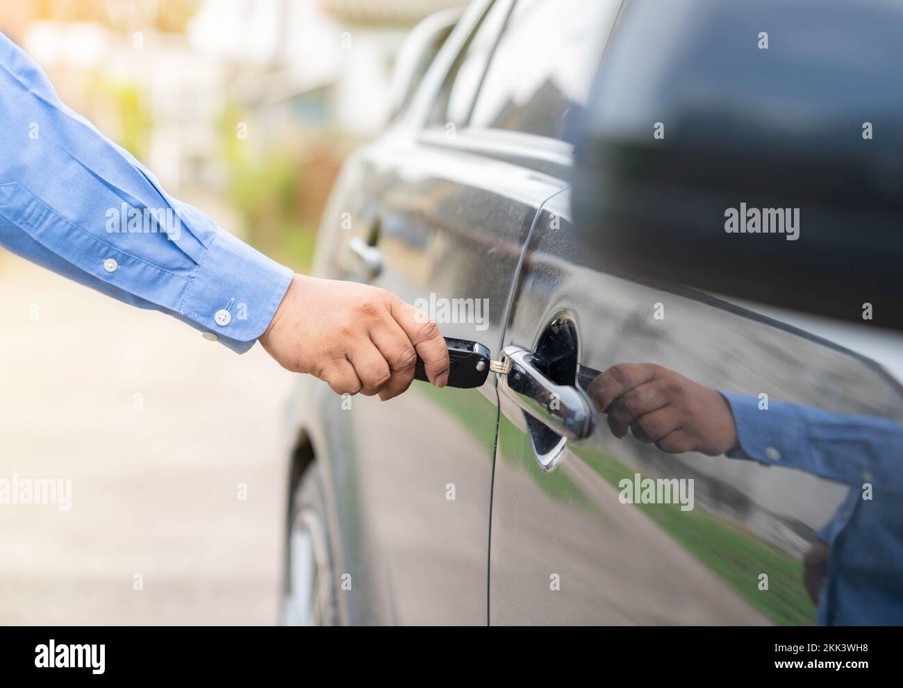 Person locking car remote hi-res stock photography and images - Alamy