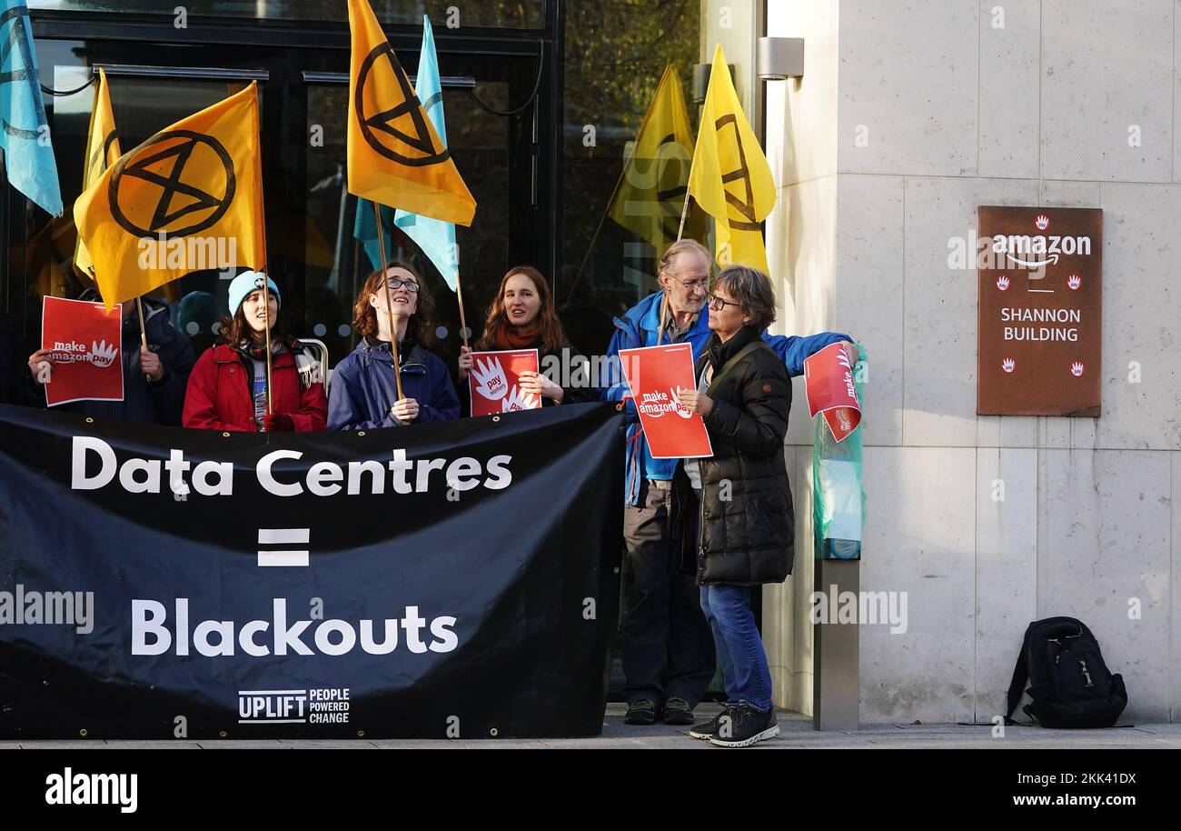 People attend a protest outside Amazon's European Headquarters in ...