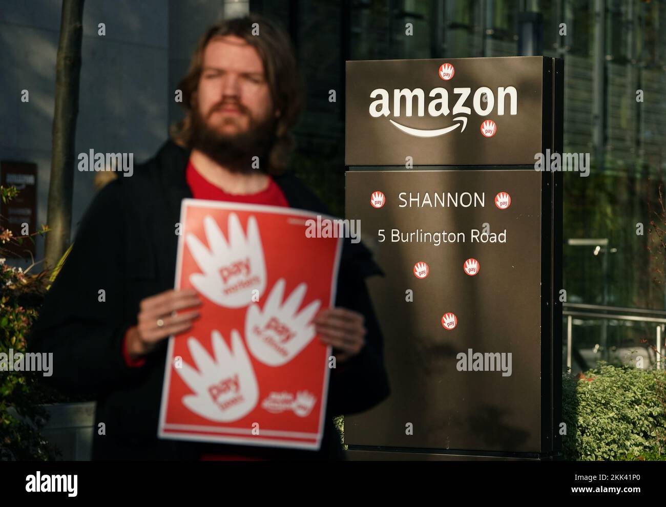 Stickers which were placed on the Amazon logo during a protest outside ...