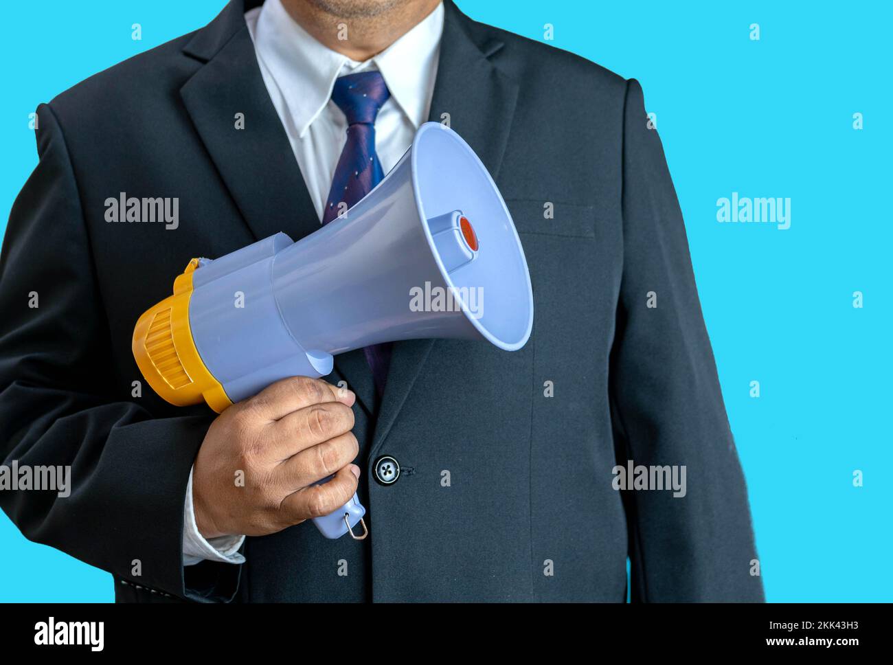 A megaphone in leader for public speech isolate on aqua blue background ...