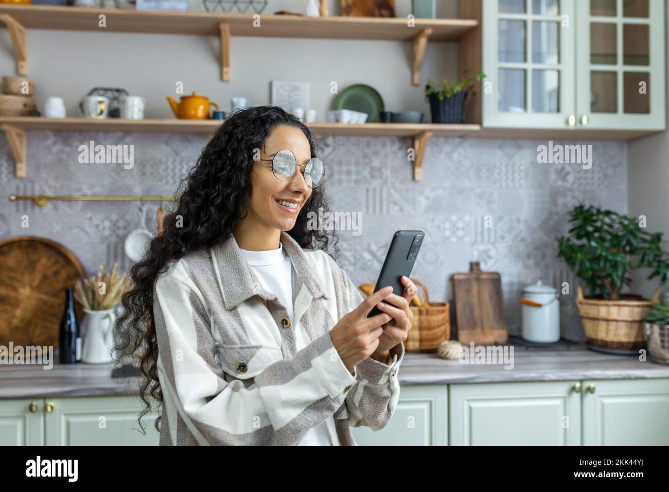 Latin woman in glasses reads hi-res stock photography and images - Alamy