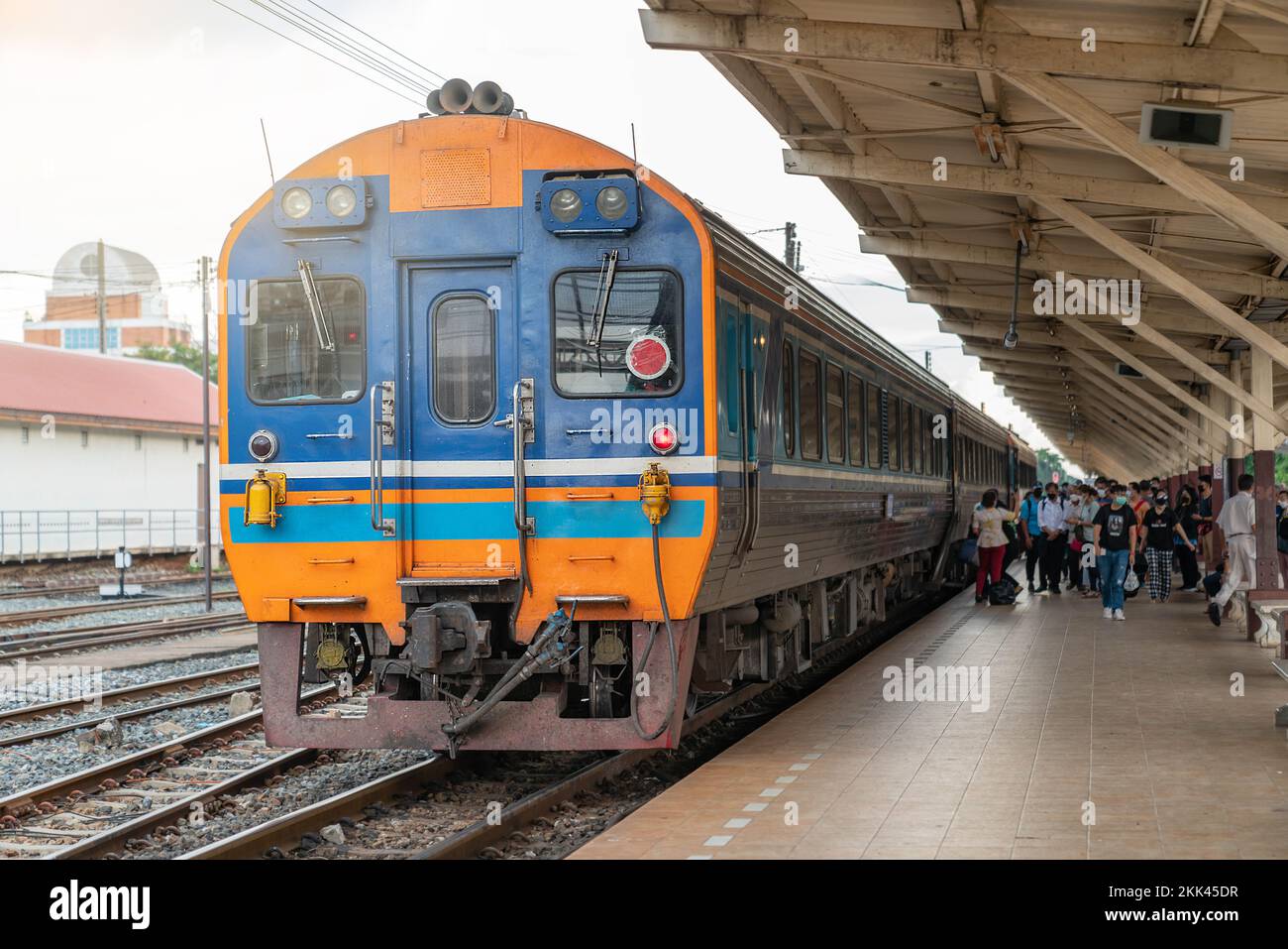 Train transport passenger in destination railway station. Train station ...