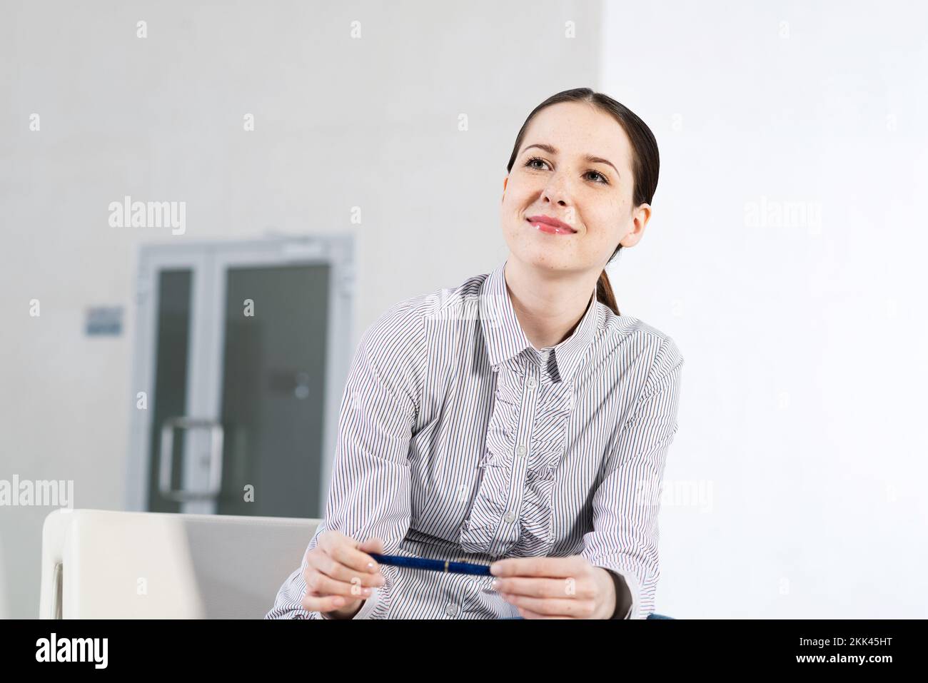 attractive young woman, cute and smiling Stock Photo - Alamy