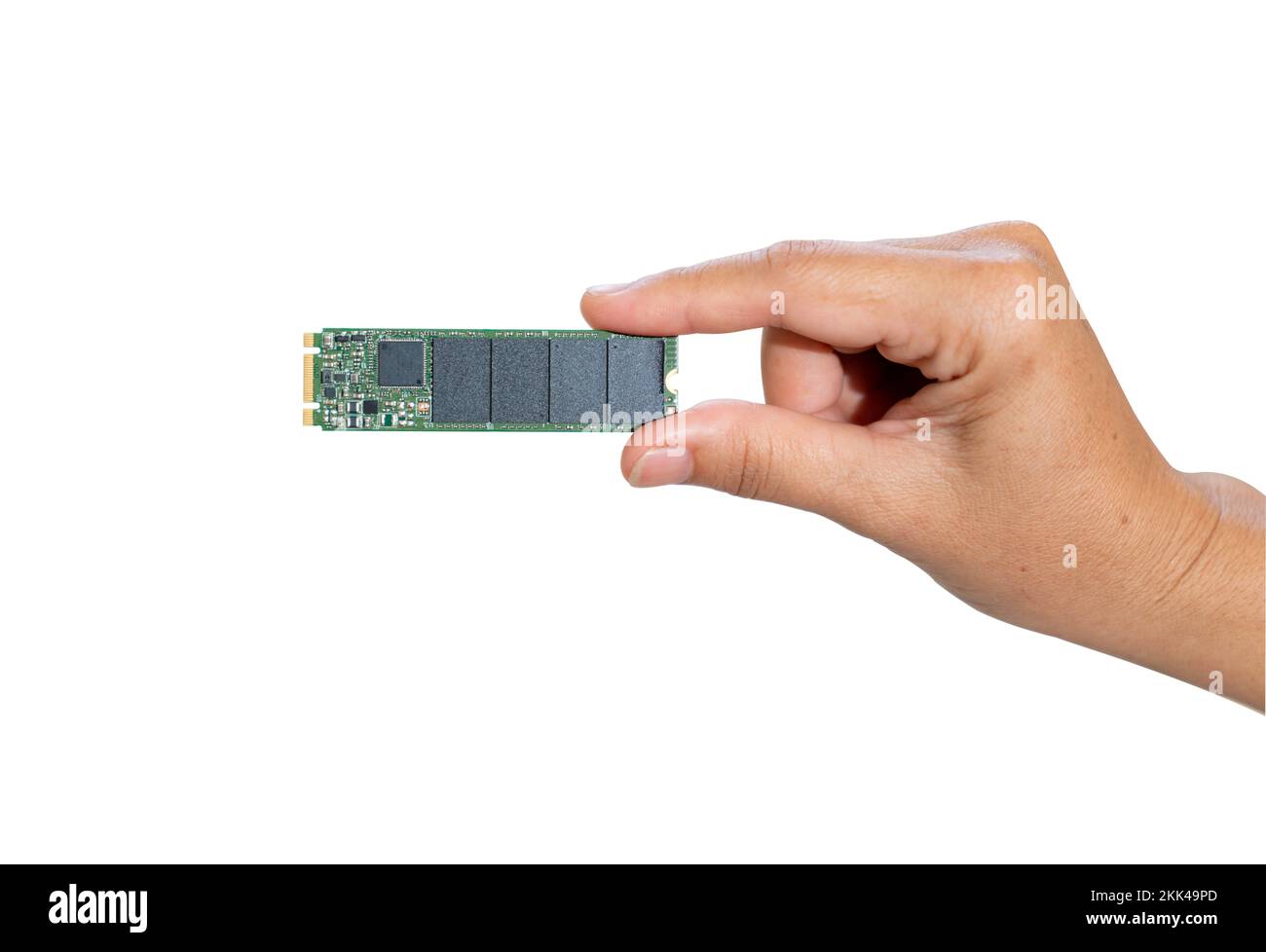 A hand holds an ssd disk of m2 format isolate on white background. New ...