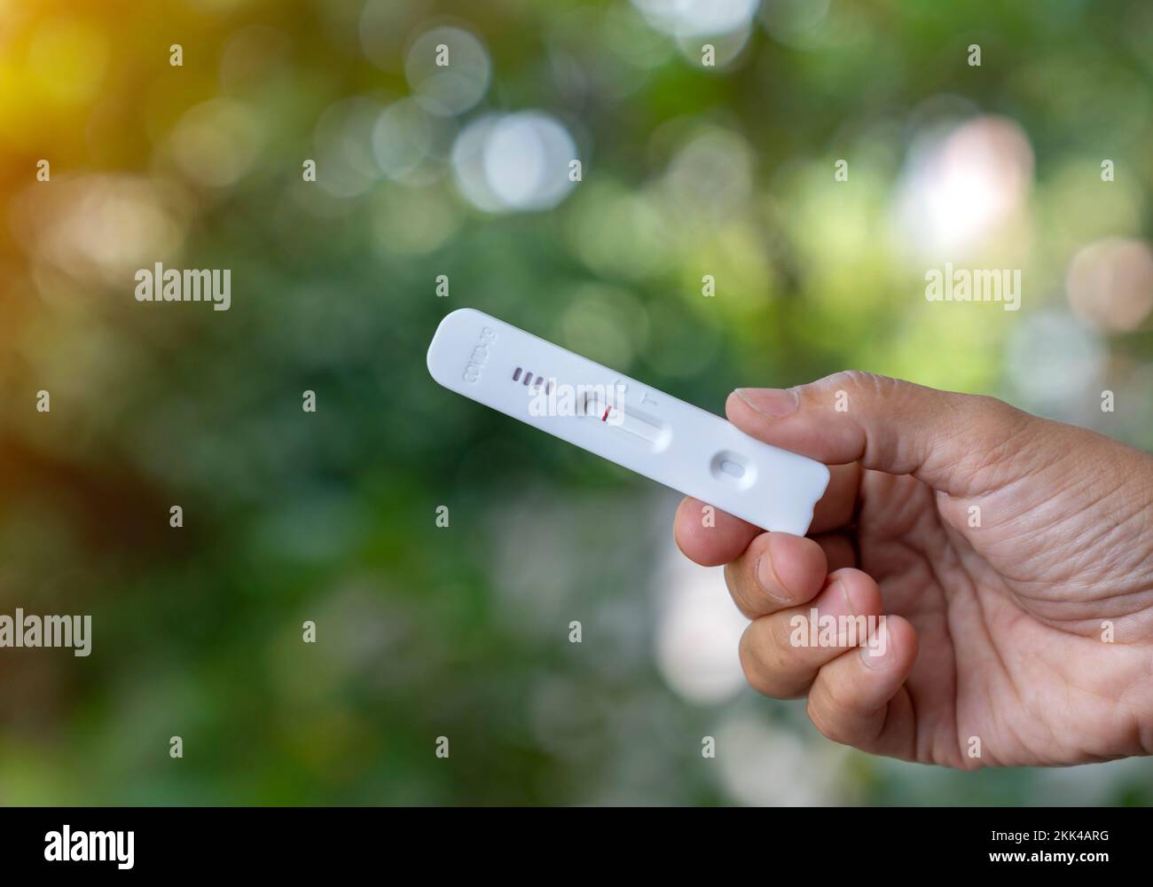 Close up of people holding SARS 2019-nCoV COVID-19 antigen rapid test ...