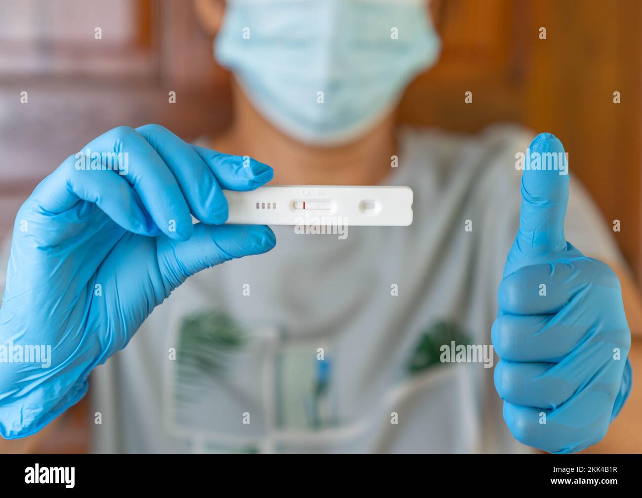 Negative test result by using rapid test device for COVID-19. She happy ...