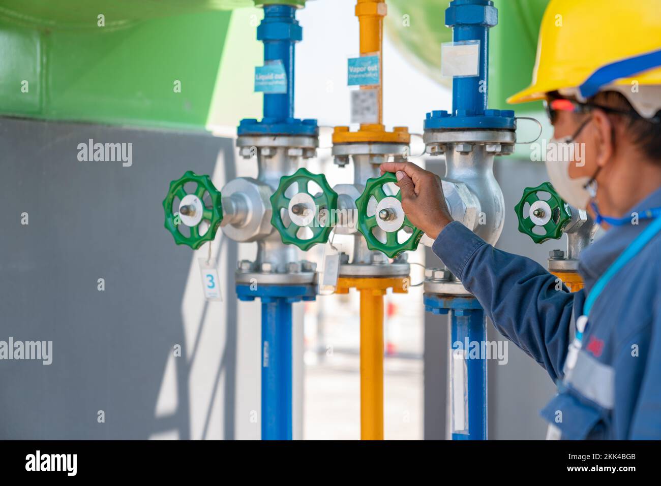 Production operator close ball valve at LPG plant for control gases and ...