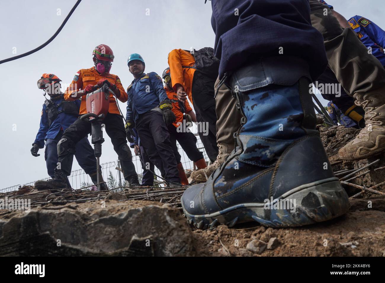 Cianjur, West Java, Indonesia. 25th Nov, 2022. Rescuers perform an ...