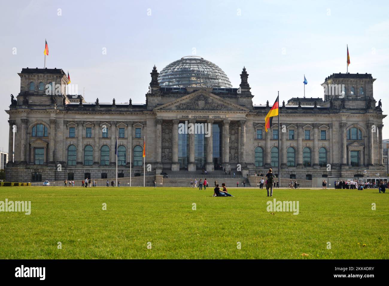 The landscape of the Berlin Reichstag building with national flags of ...