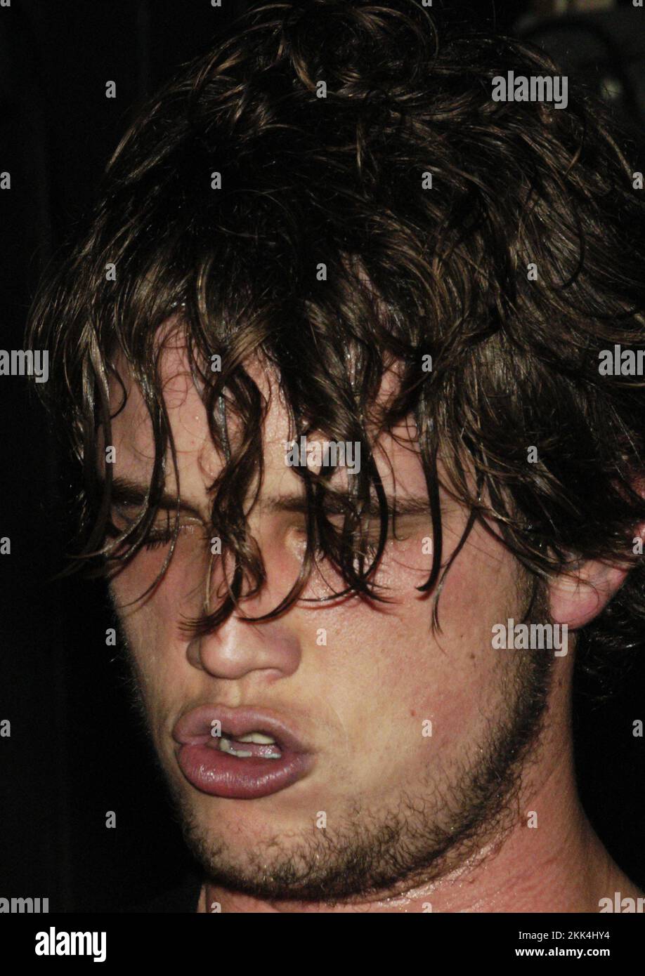 Singer Nick Atkinson from the pop band ROOSTER playing a sweaty early ...