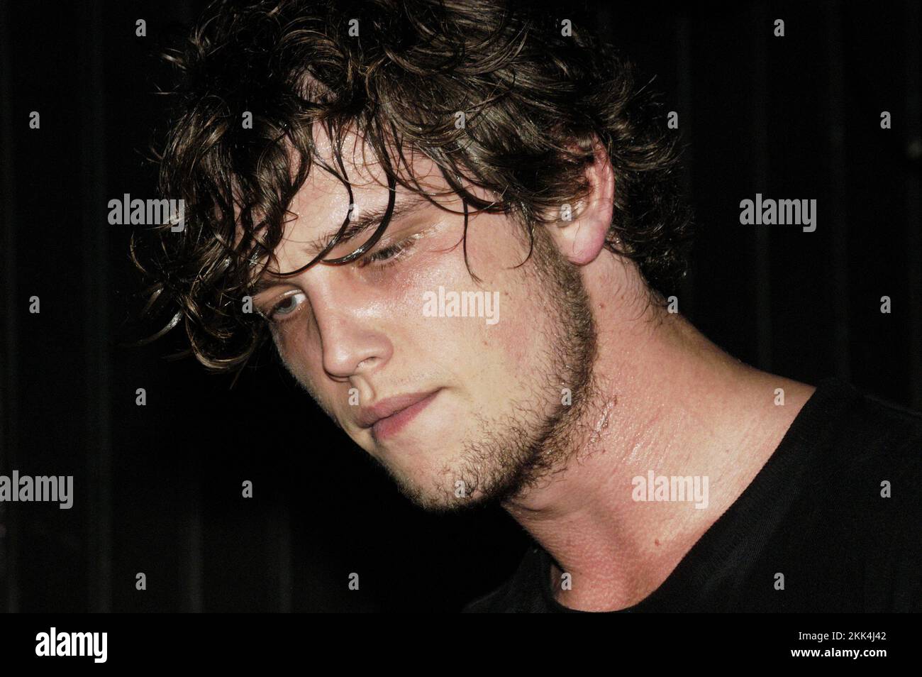 Singer Nick Atkinson from the pop band ROOSTER playing a sweaty early ...