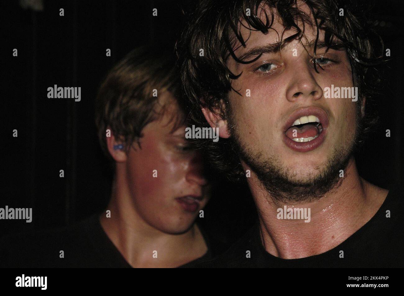 Singer Nick Atkinson from the pop band ROOSTER playing a sweaty early ...