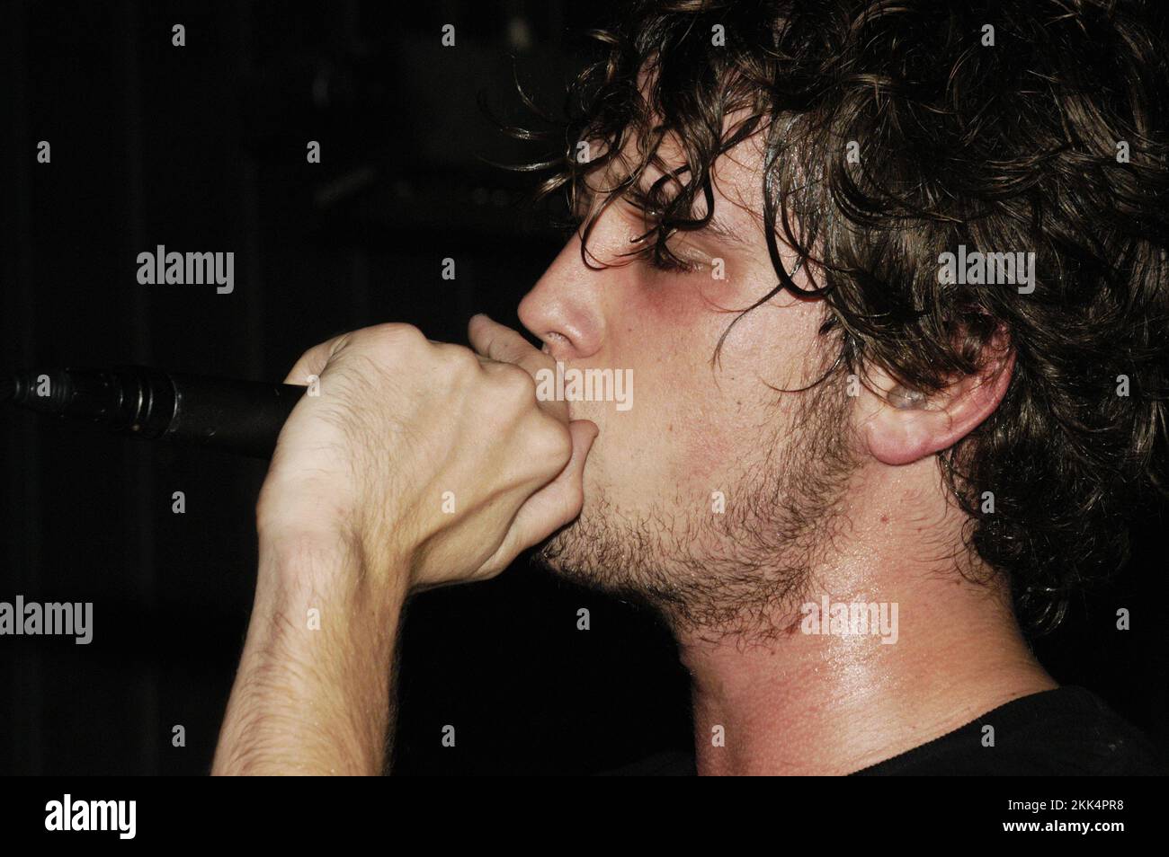 Singer Nick Atkinson from the pop band ROOSTER playing a sweaty early ...