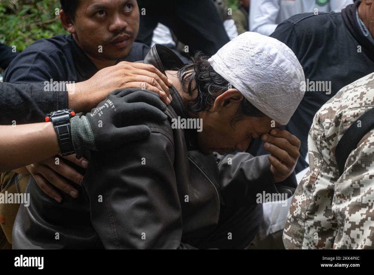 Cianjur, West Java, Indonesia. 25th Nov, 2022. Ahmad Asikin, father of ...