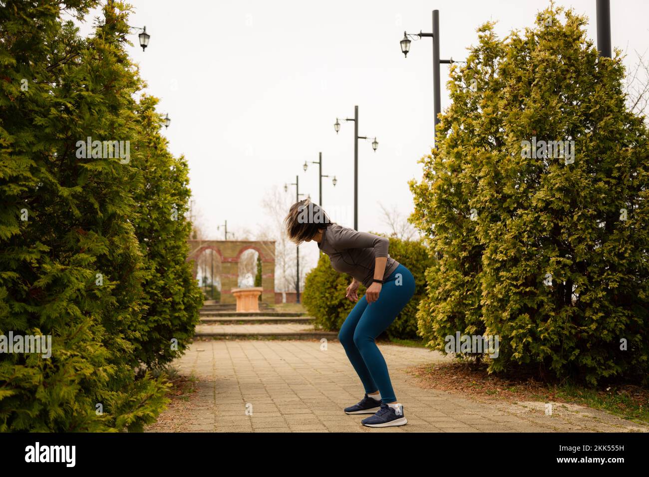Amazing girl working out in the park Stock Photo - Alamy