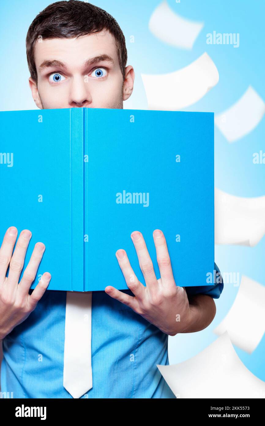 Peeping over book hi-res stock photography and images - Alamy