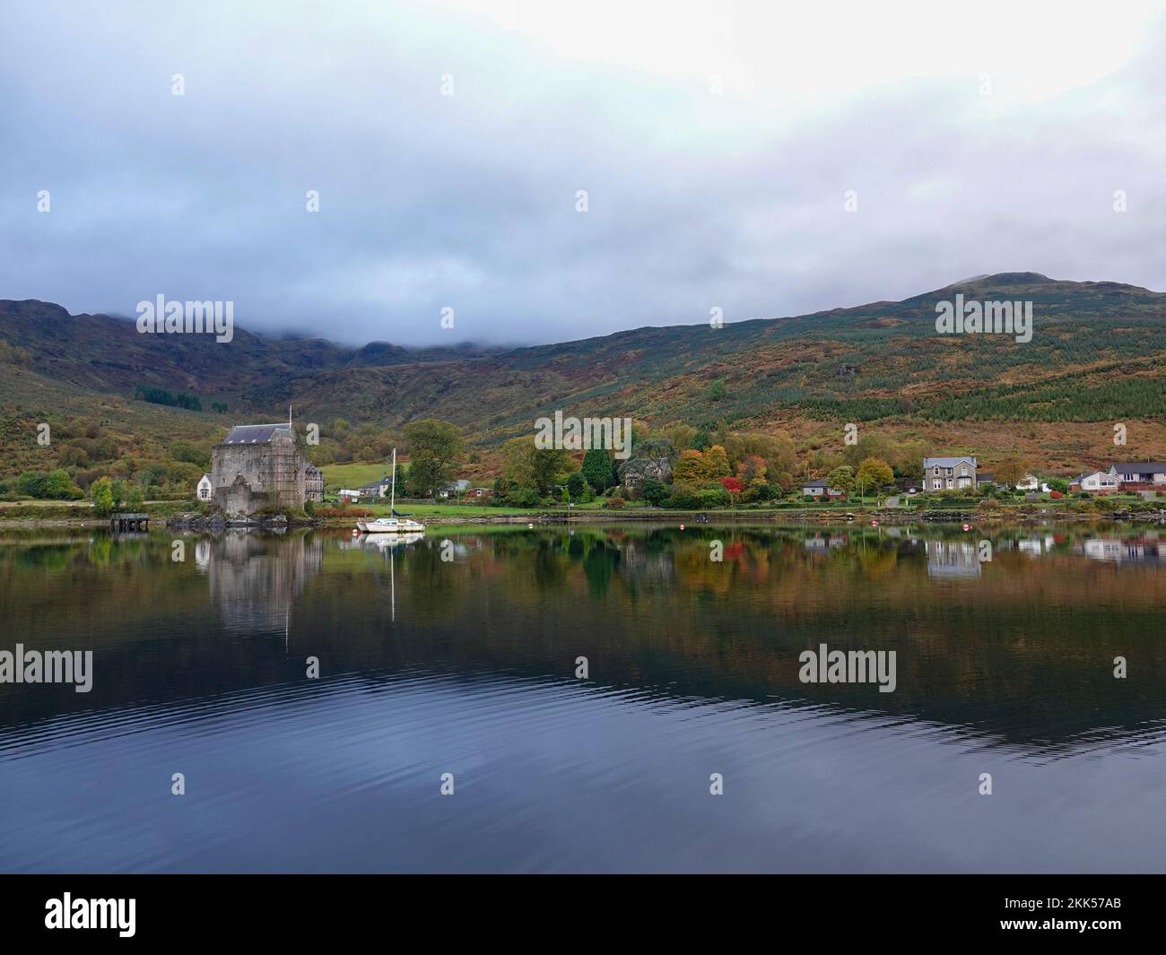 Castle Carrick, with reflections in Loch Goil on a foggy October ...