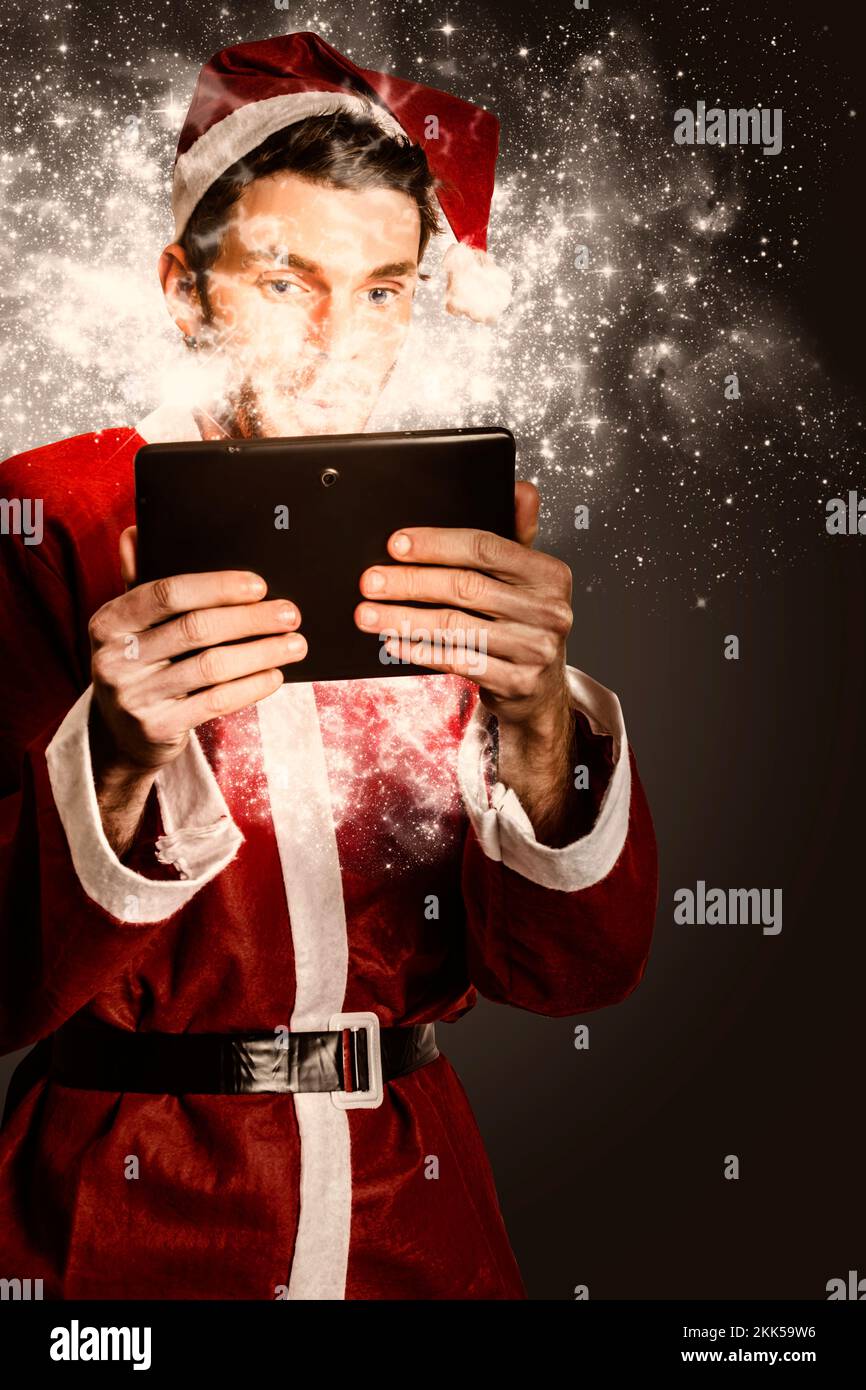 Creative digital artwork of a technology santa browsing online with ...