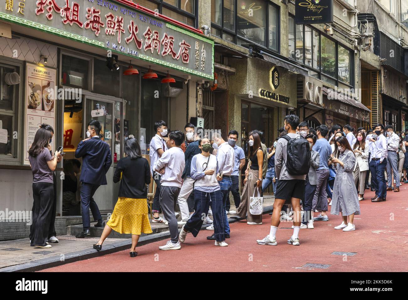 Diners queue outside a restaurant in Lan Kwai Fong. 20OCT22 SCMP ...