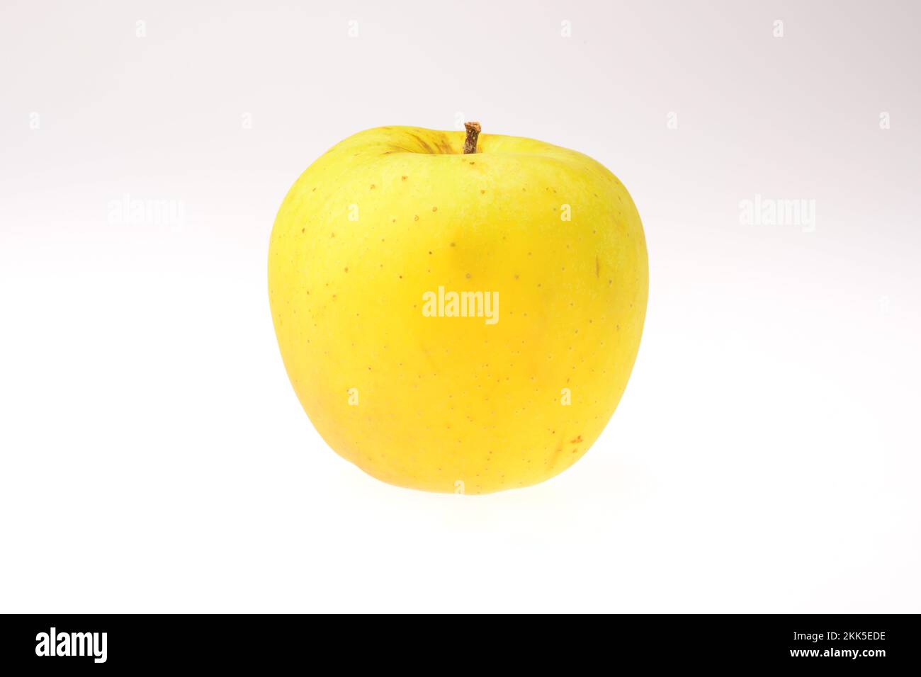 fresh yellow apple isolated on white background Stock Photo - Alamy