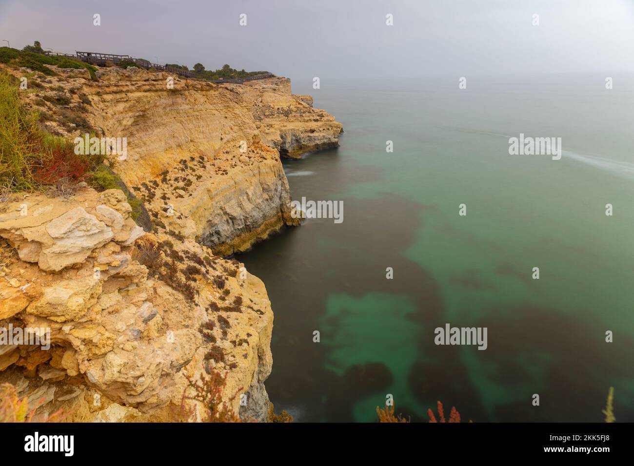 The famous coastline of Algarve in Portugal with Sandstone Cliffs ...