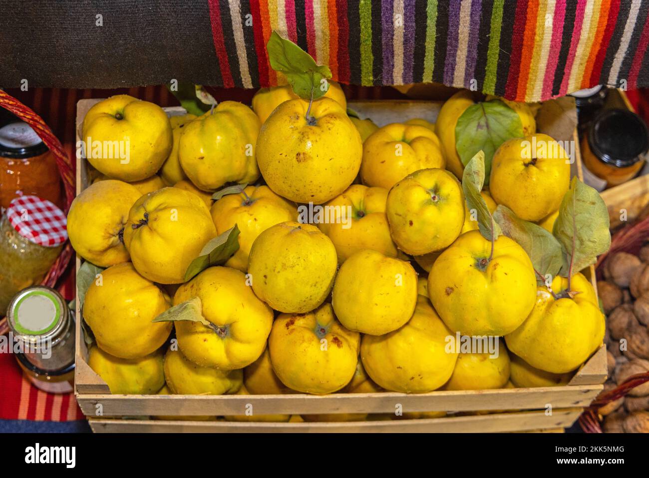 Yellow Quince Fruits in Crate at Indoor Farmers Market Stock Photo - Alamy