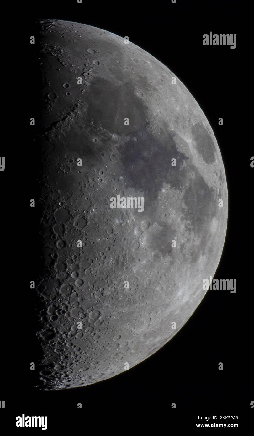 A scenic zoomed-in shot of the moon in the night sky Stock Photo - Alamy
