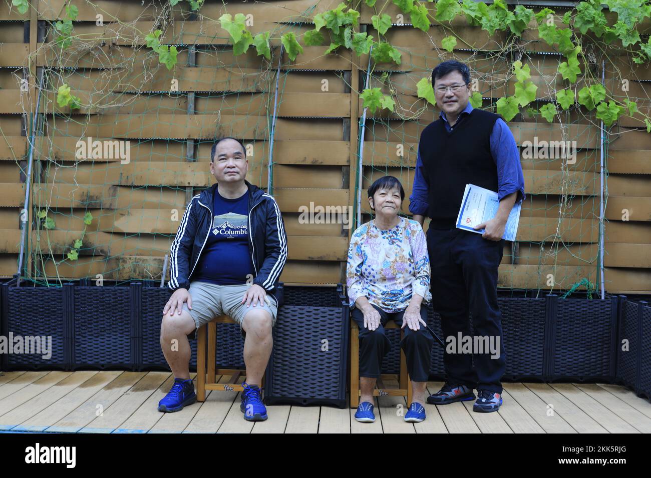 From left, Ho Kai-Shing, Ou xiulan and Pastor Stephen Chan photographed ...