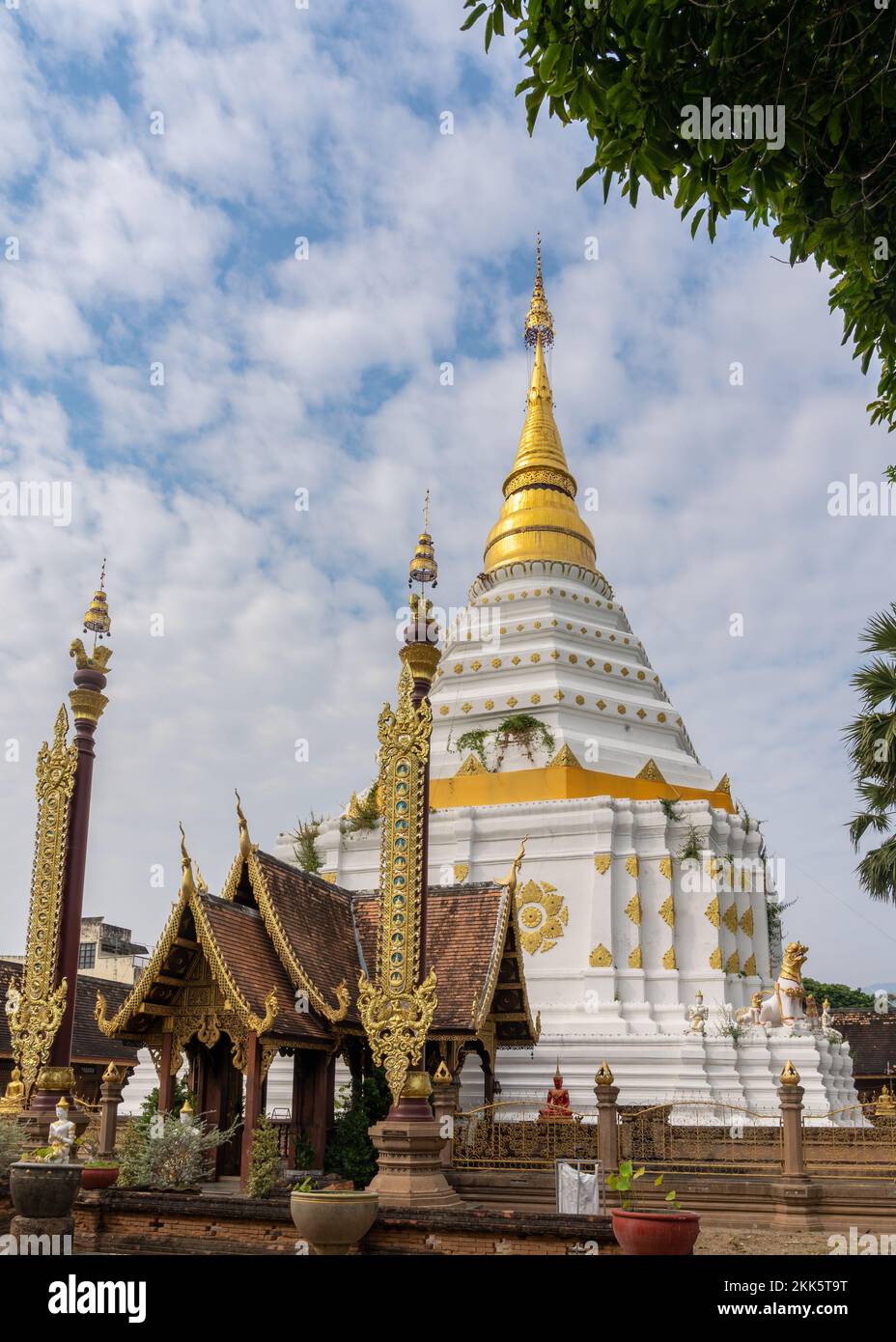 Landscape view of old octagonal stupa or chedi with pavilion and Lanna ...