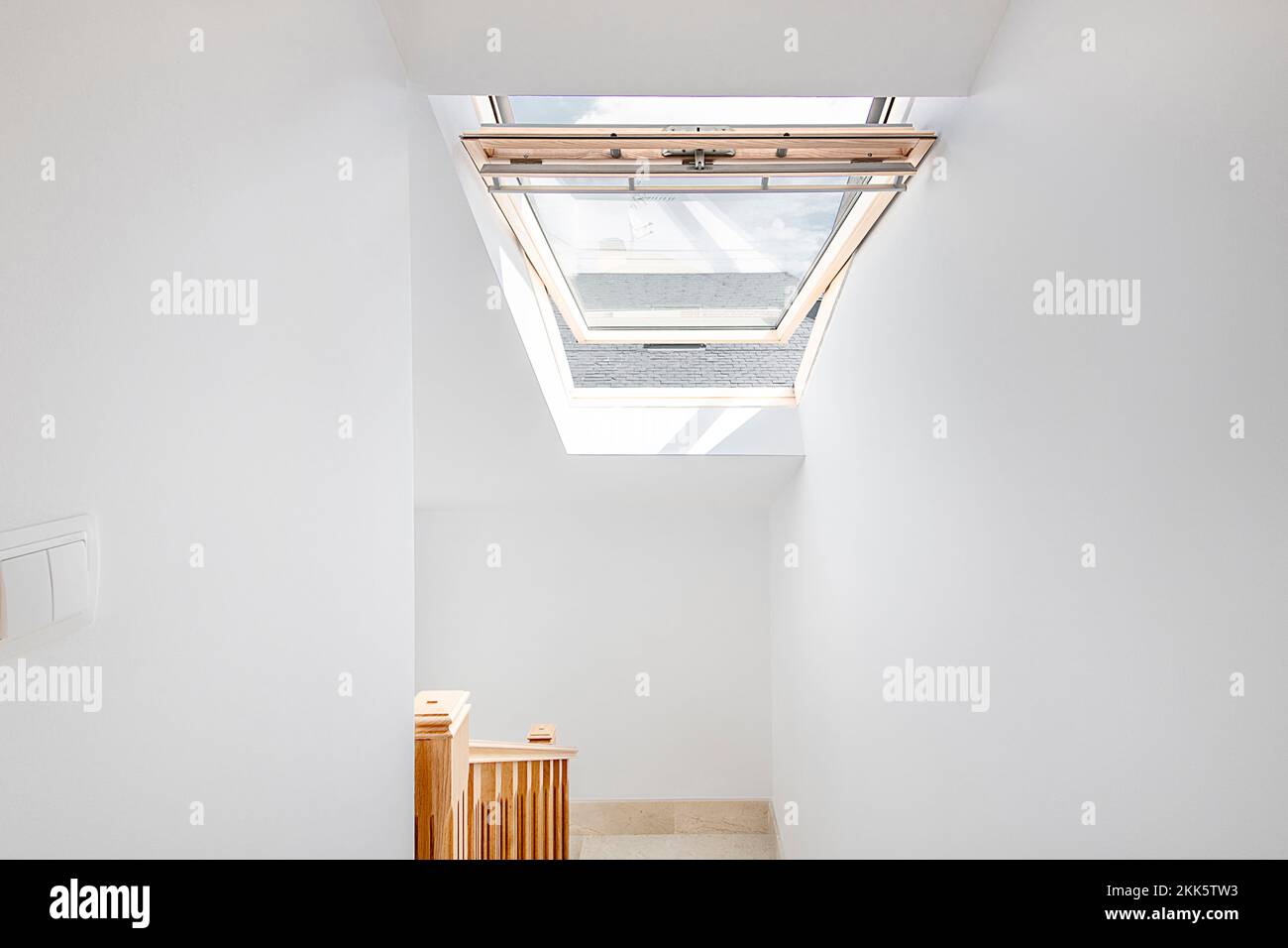 Stairs of a residential house with an attic with a tilt-and-turn ...