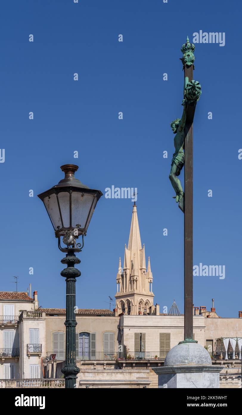 Cityscape view of old St Anne catholic church bell tower with crucifix ...