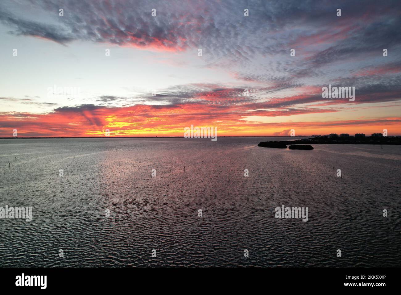 An aerial view of the ocean during scenic sunrise in Longboat Key ...