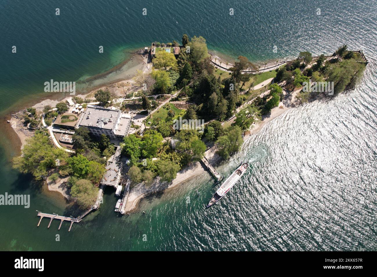 The aerial top view of a small island with buildings and trees Stock ...