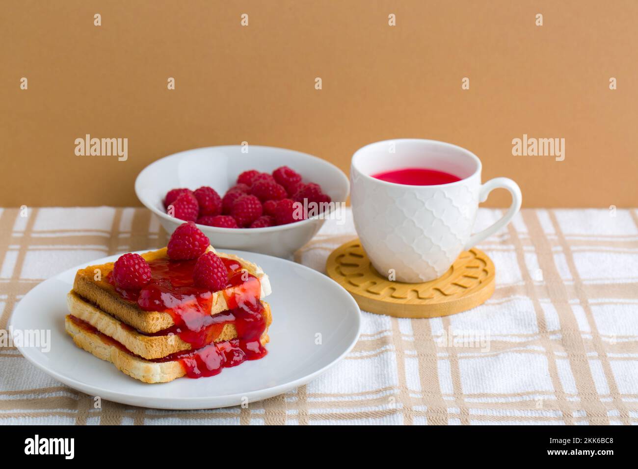 Cup of red tea and toasted bread Stock Photo - Alamy