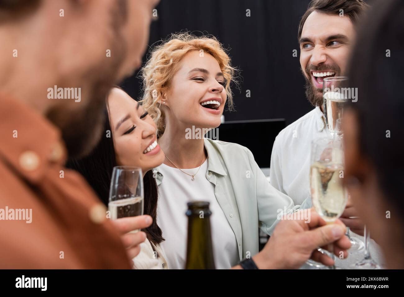 Cheerful business people toasting hi-res stock photography and images ...