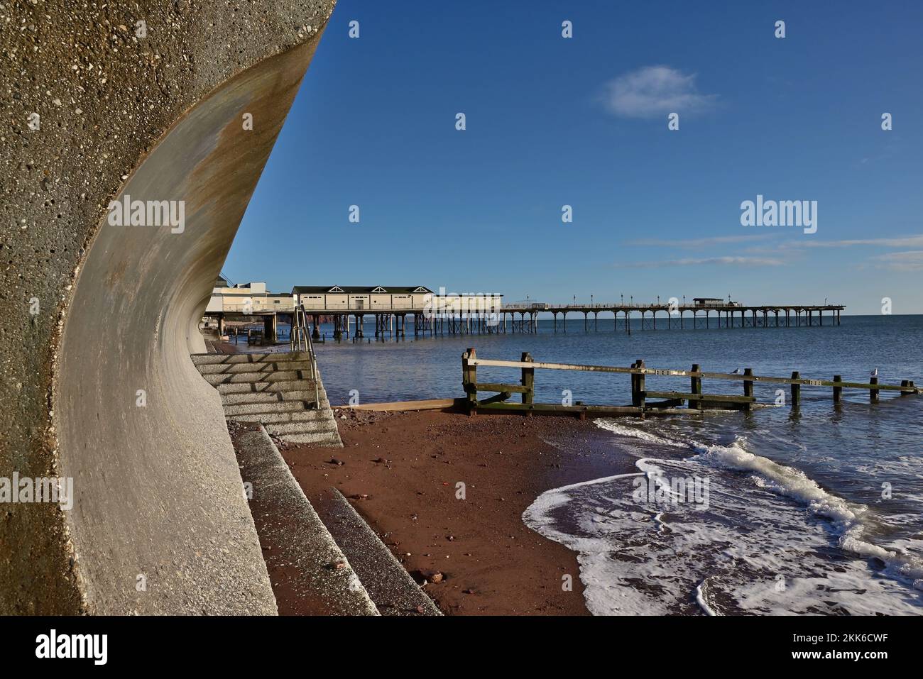 The pier and part of the seawall at Teignmouth, showing the curved ...