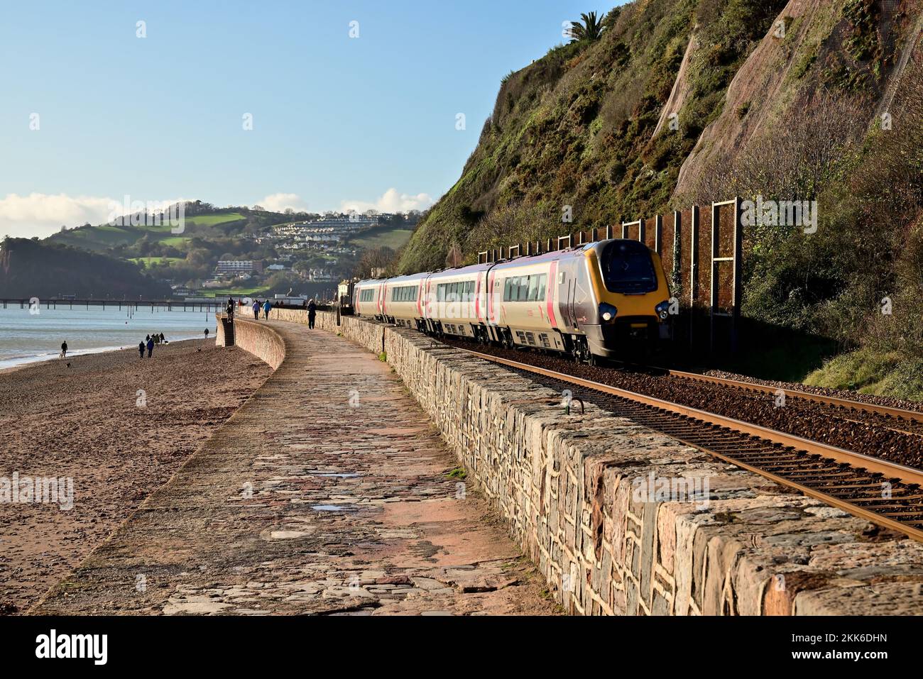 A Cross Country train travelling along the seawall at Teignmouth, South ...