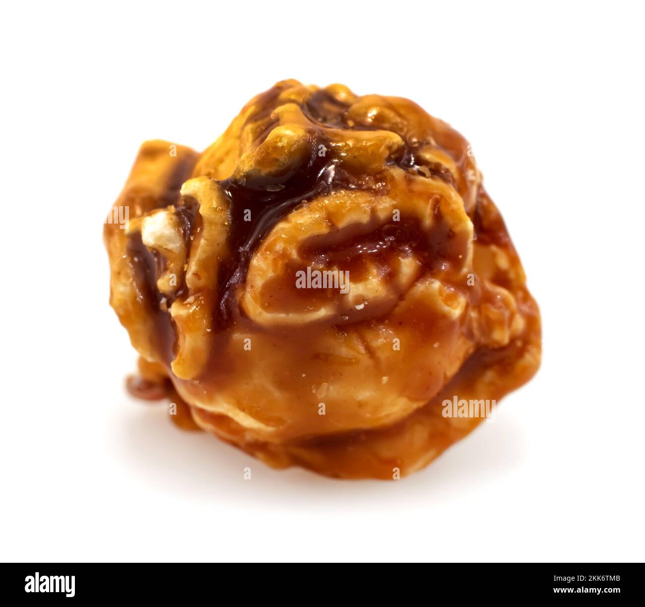 Caramel popcorn on a white background close-up. Popcorn Granule Isolate ...