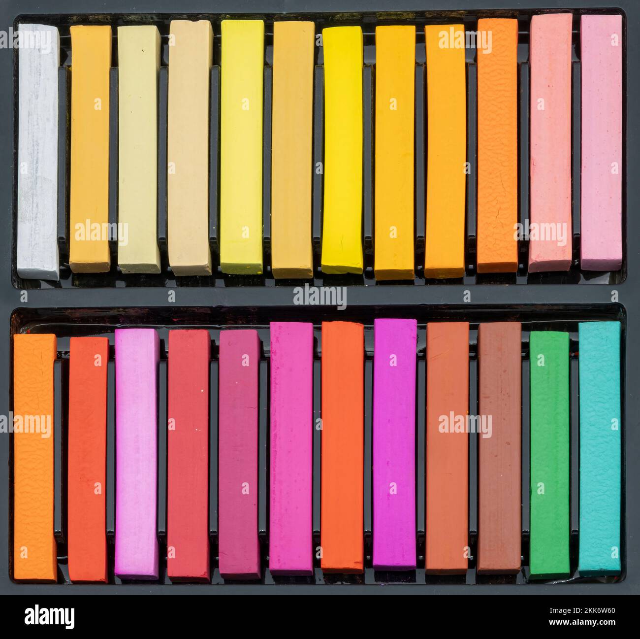 A box of pastel chalks - many different, intense colours in a pastel ...