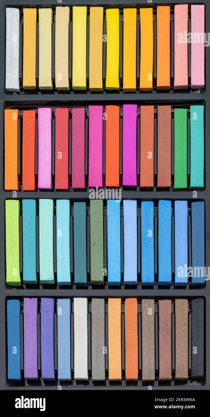 A box of pastel chalks - many different, intense colours in a pastel ...