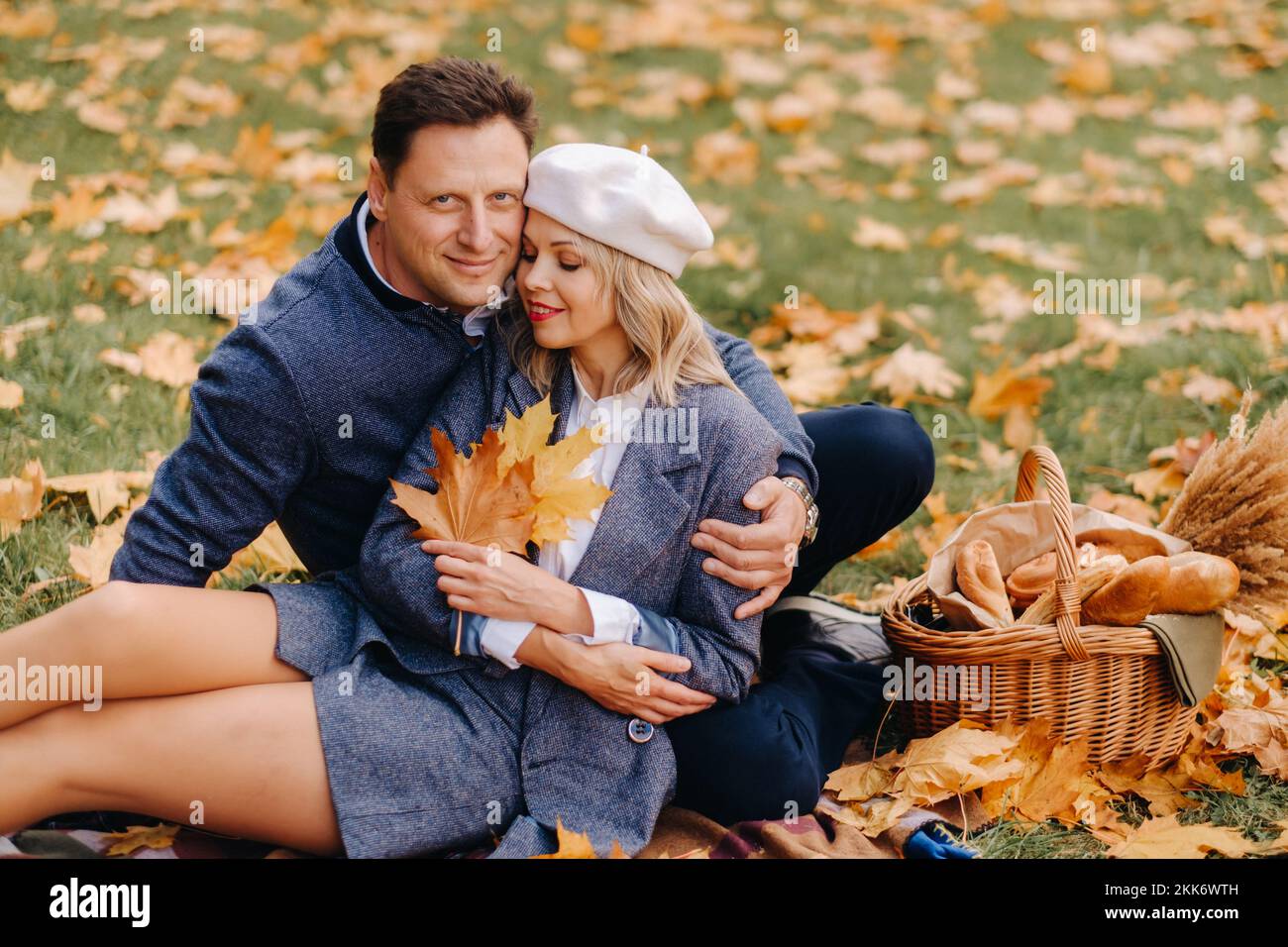 Happy couple enjoying golden autumn spring season in the park Stock ...