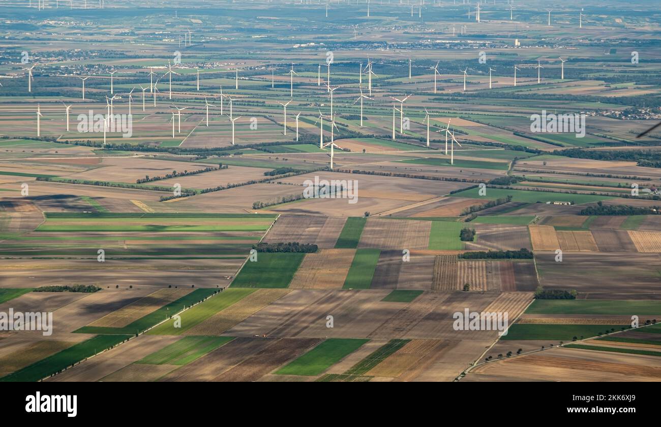 Aerial photography of Austrian agriculture fields, wind turbines ...