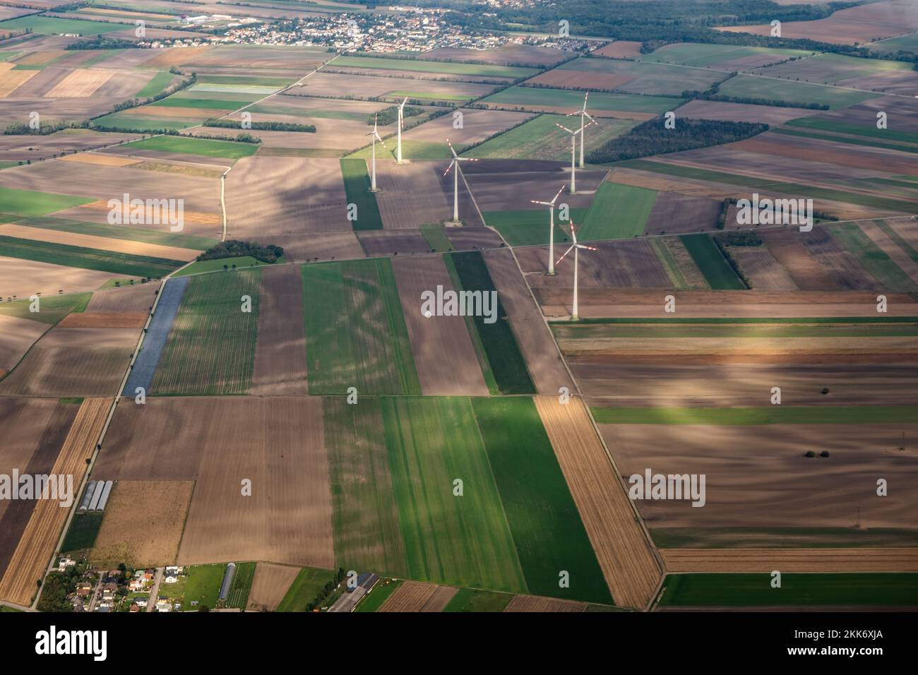 Aerial photography of Austrian agriculture fields, wind turbines ...