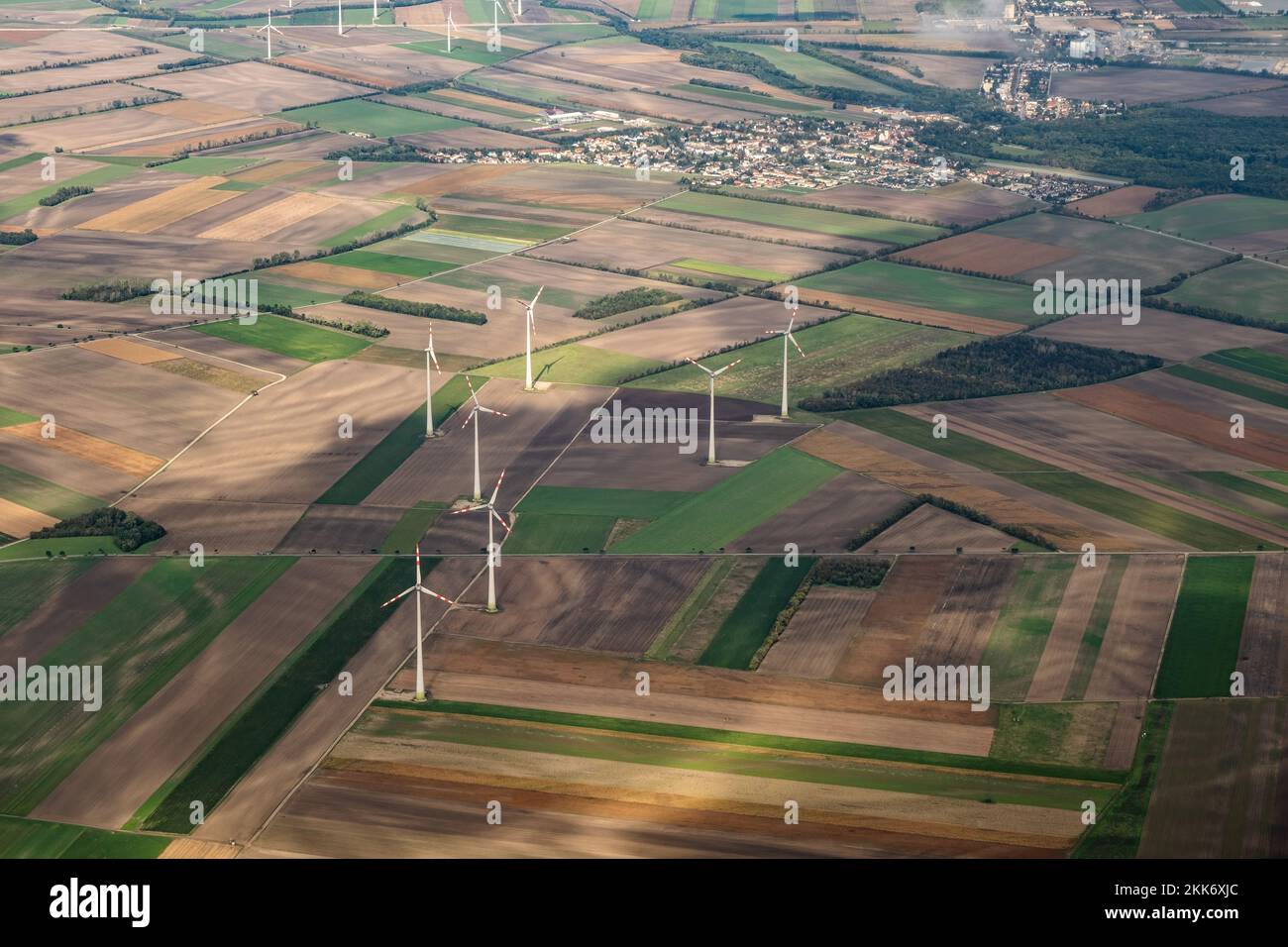 Aerial photography of Austrian agriculture fields, wind turbines ...