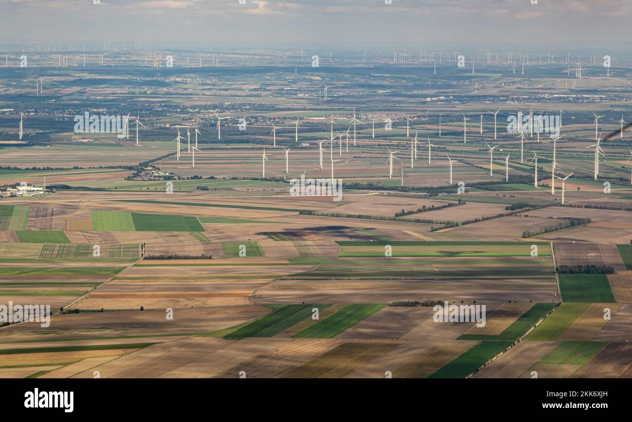 Aerial photography of Austrian agriculture fields, wind turbines ...