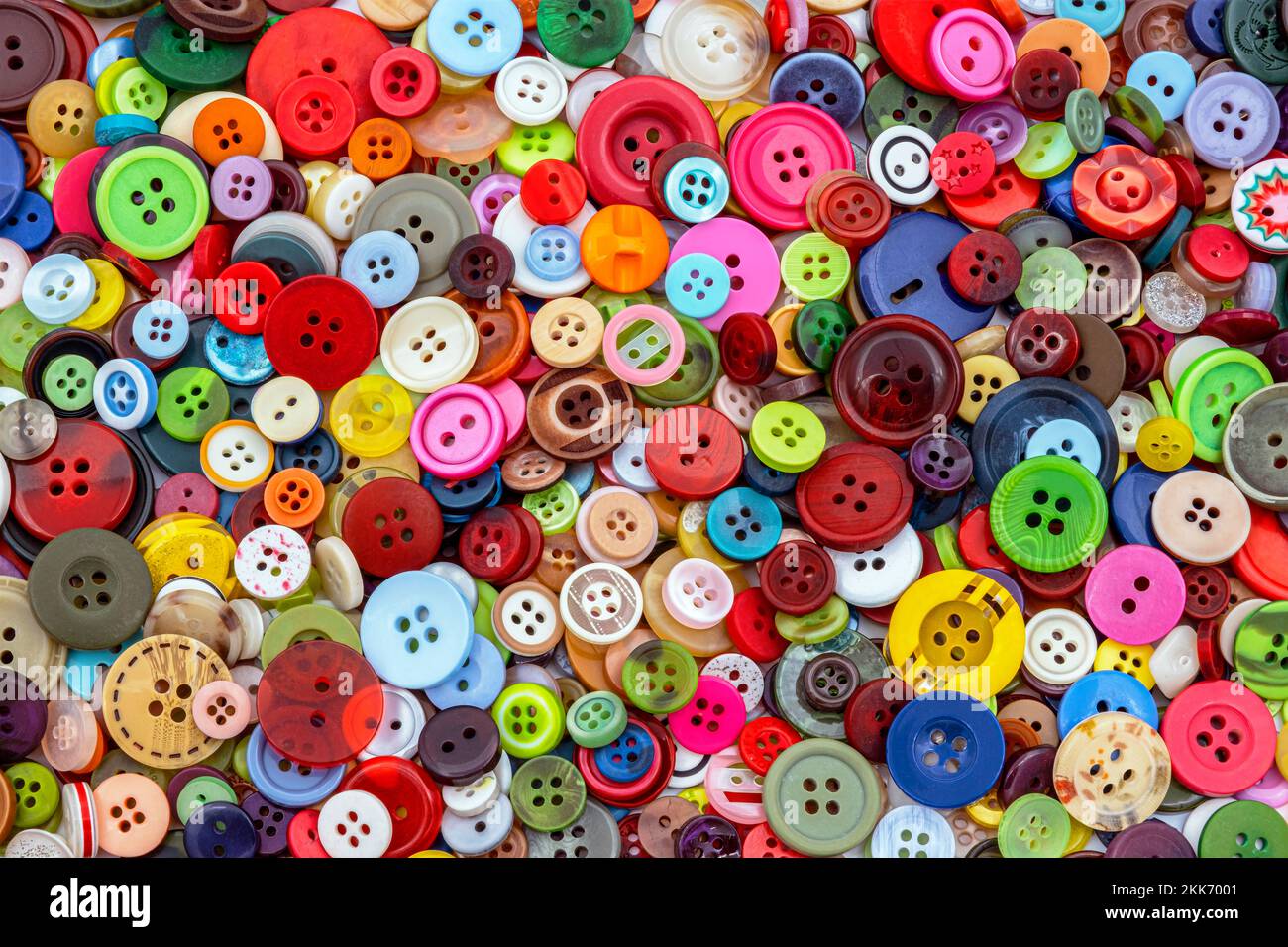 Colorful mixed sewing buttons background. Top view Stock Photo - Alamy